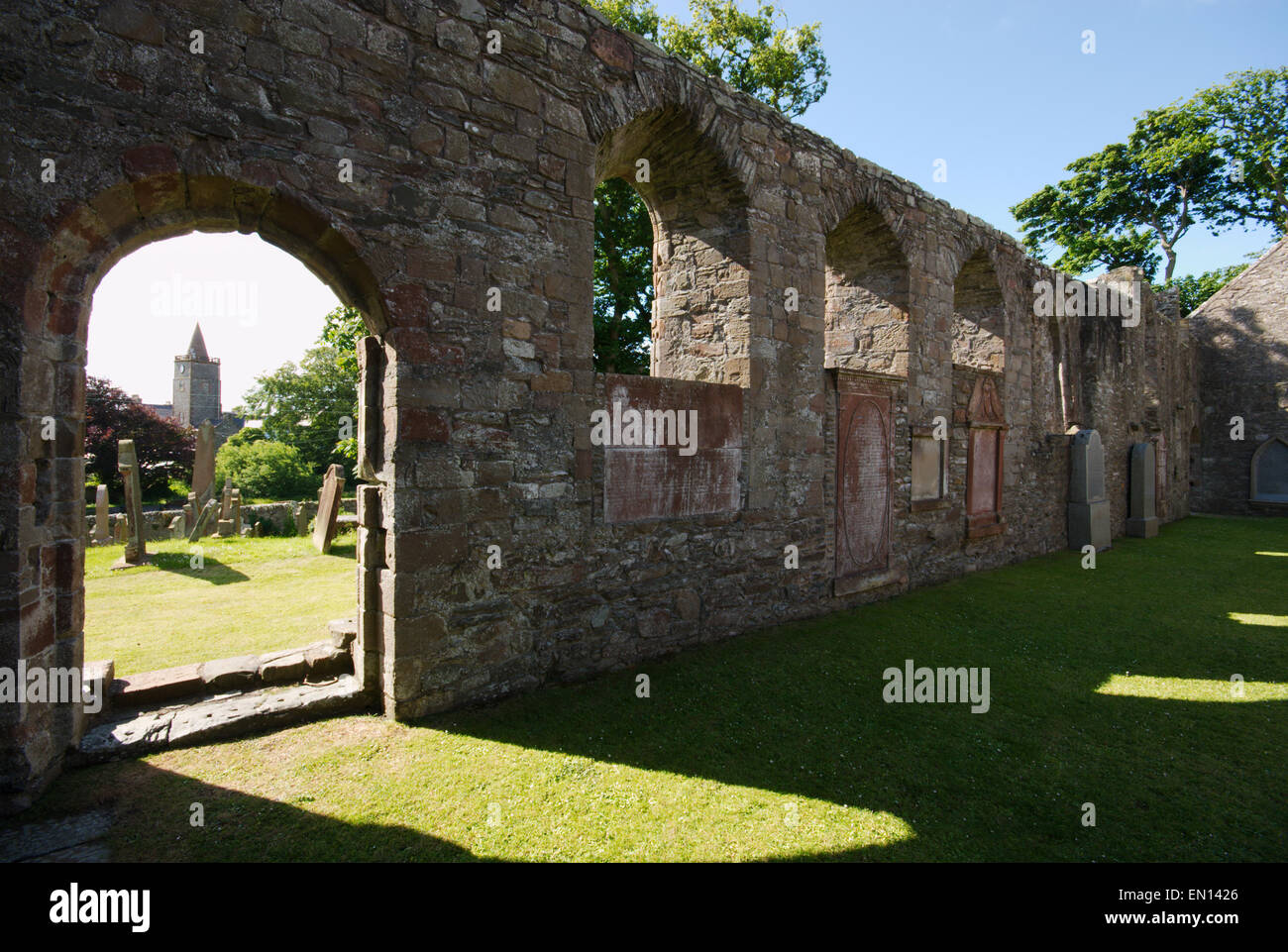 Morning sunlight pours through the ruins of Whithorn Cathedral ...