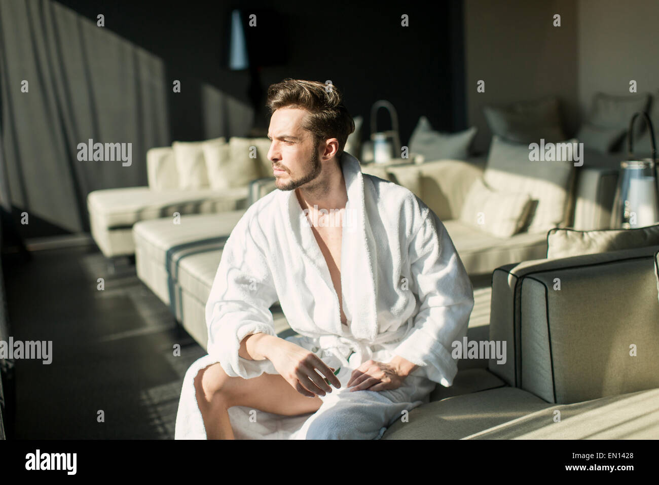 Young man in the room at morning Stock Photo - Alamy