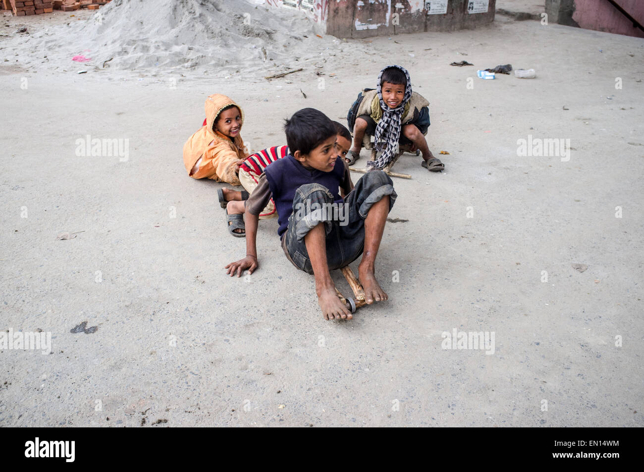 Poor rural children playing road hi-res stock photography and images ...