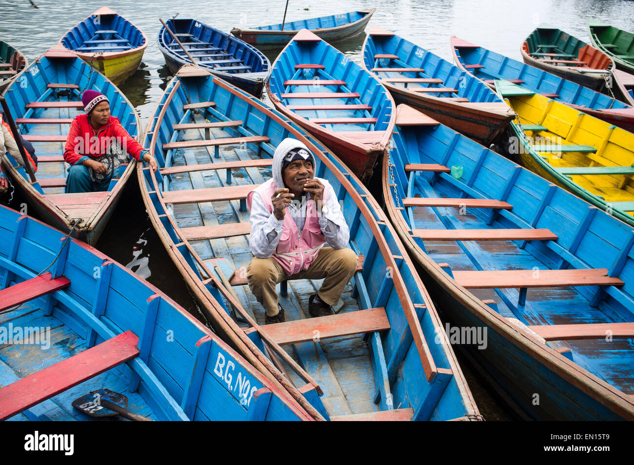 Local people boats on shore hi-res stock photography and images - Alamy