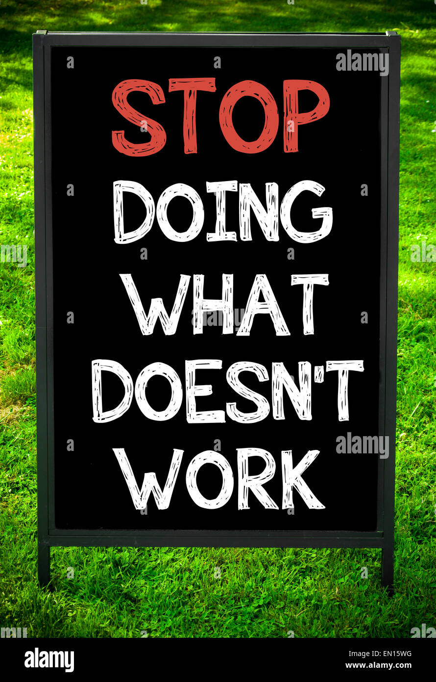 STOP DOING WHAT DOESN'T WORK message on sidewalk blackboard sign ...