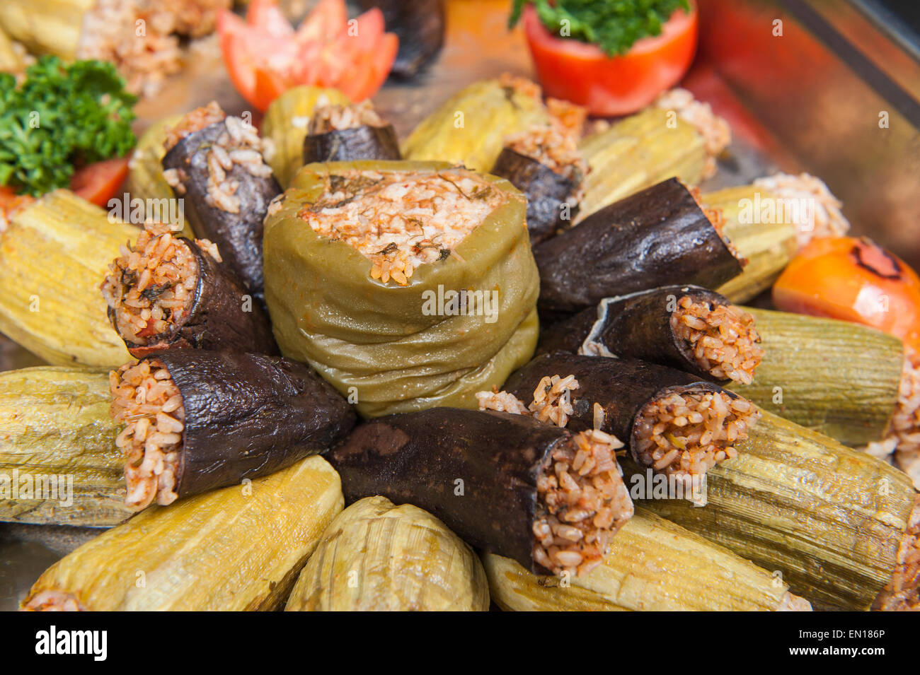 Closeup detail of dolma stuffed vegetables on display at an oriental ...