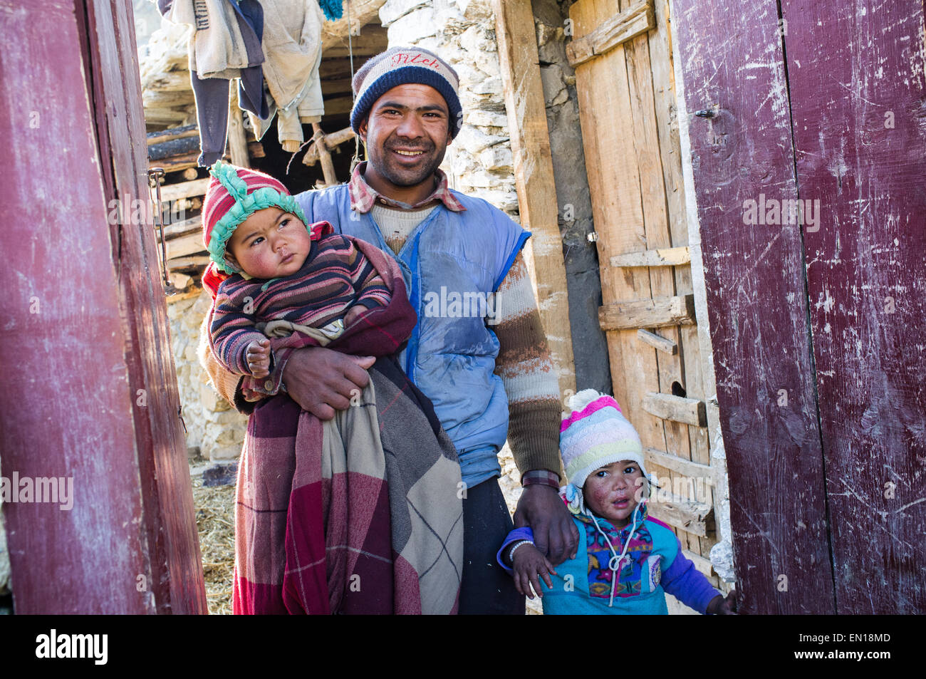 portrait of the father with his sons, Marpha village, Annapurna circuit ...
