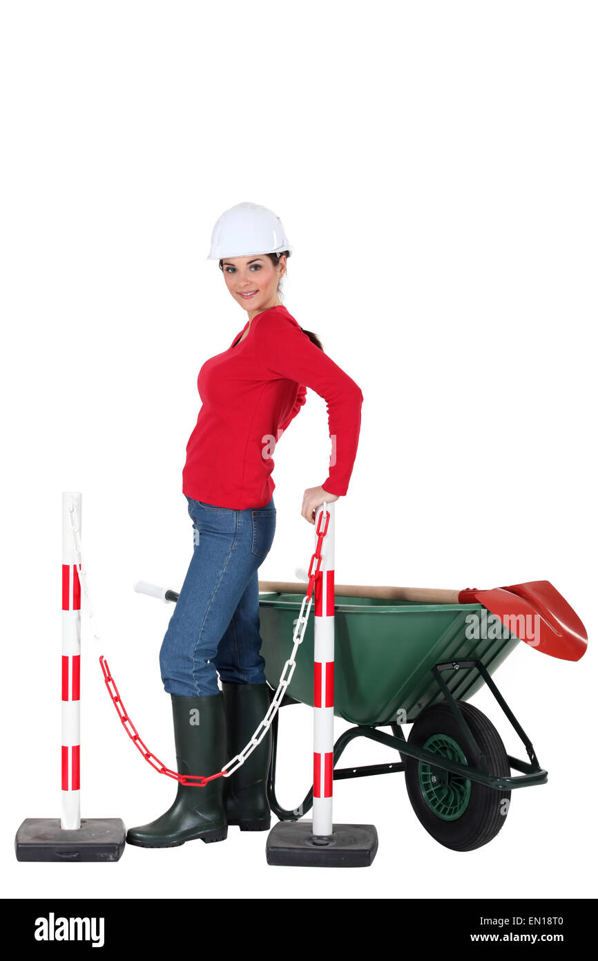 Road-side worker with wheelbarrow Stock Photo - Alamy