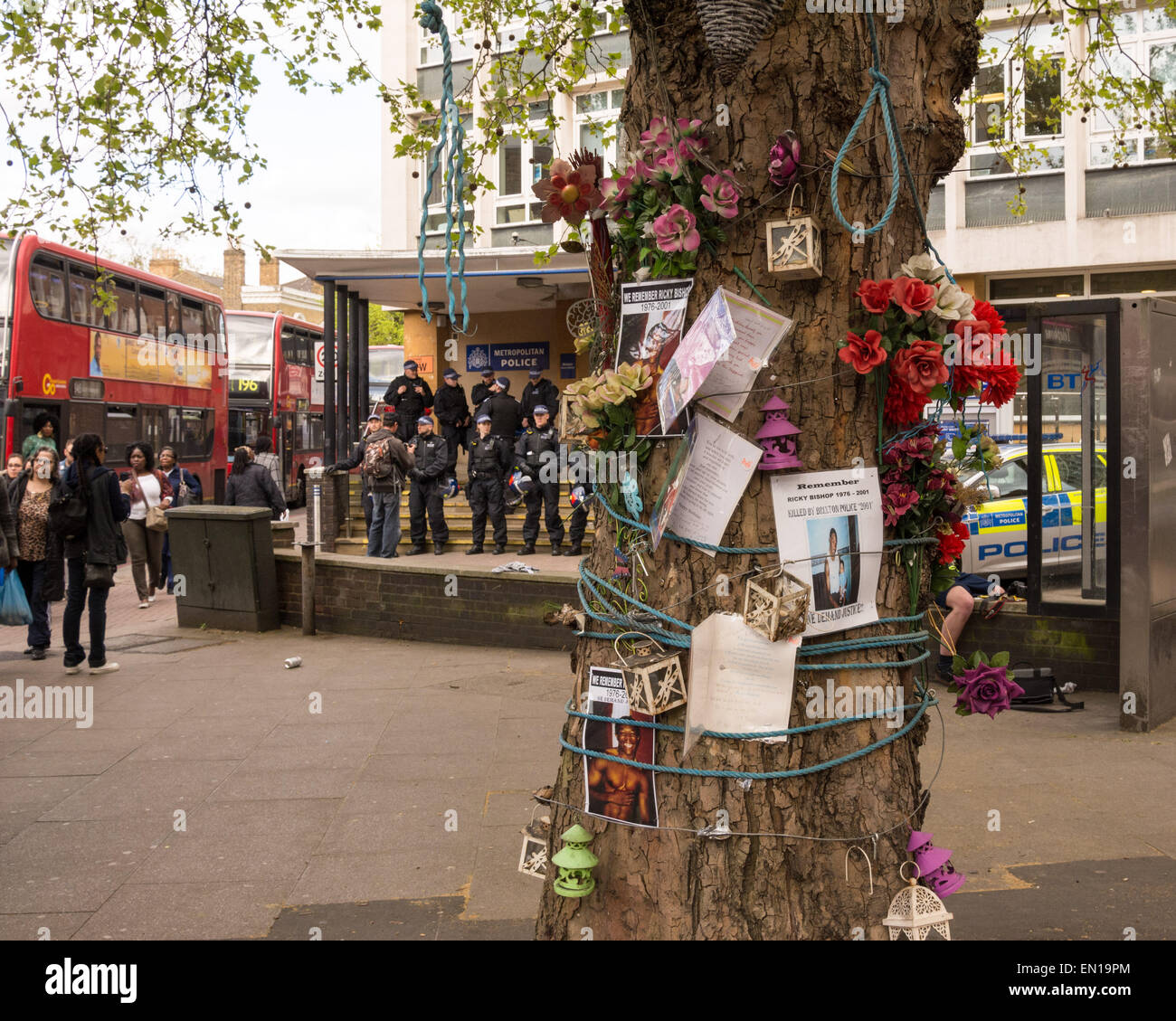 Brixton, London, 25th April 2015 Police guard the entrance to Brixton ...