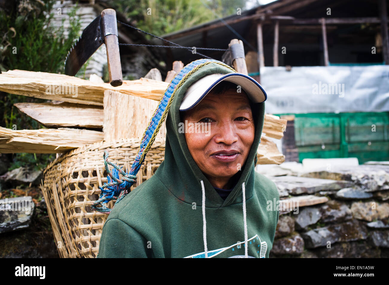 man carrying firewood, Annapurna, Nepal, Asia Stock Photo - Alamy