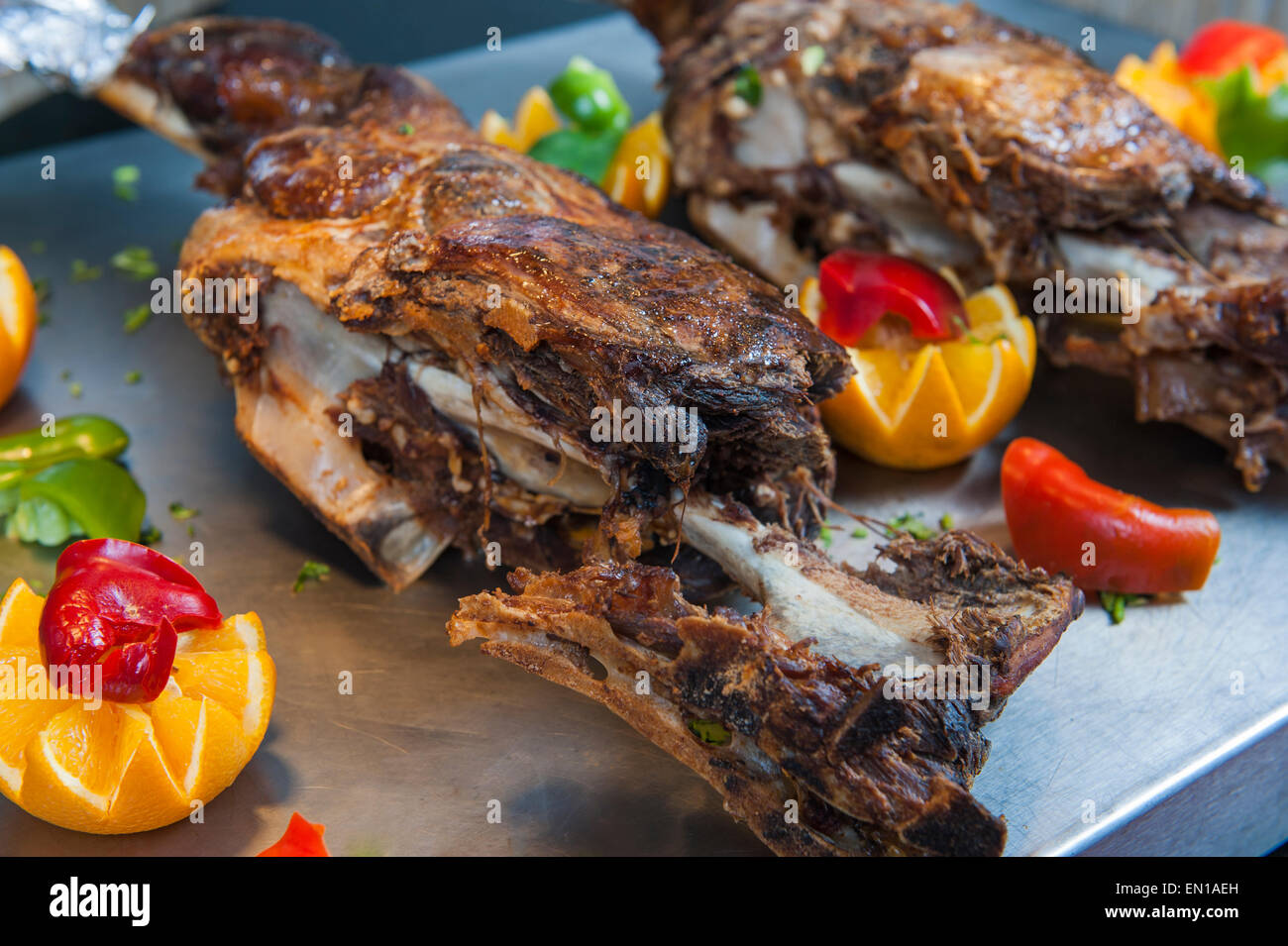 Closeup showing leg of lamb on display at a hotel restaurant buffet ...