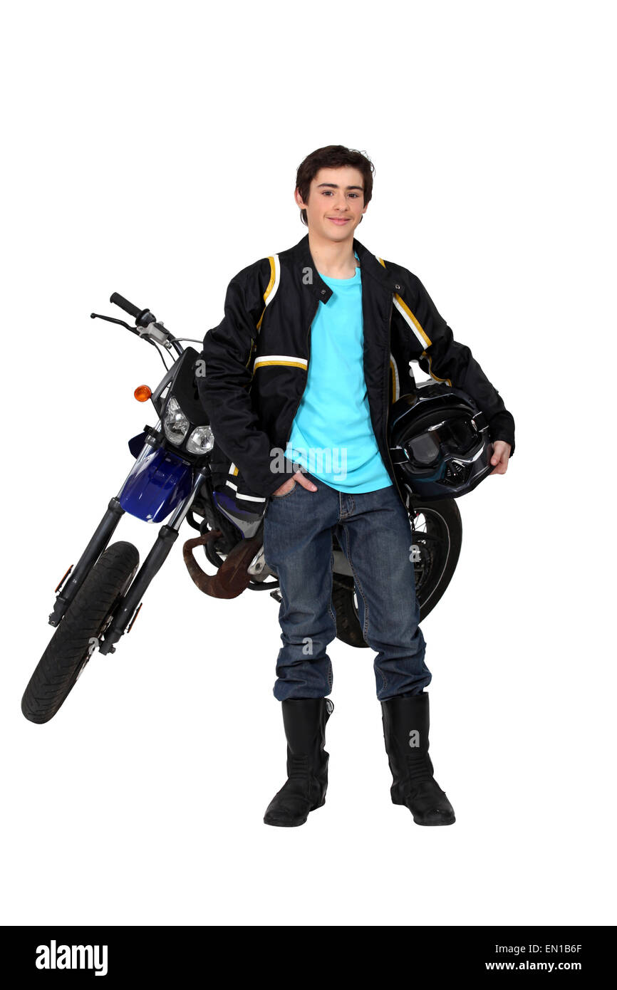 Teenager riding a motorbike Stock Photo - Alamy