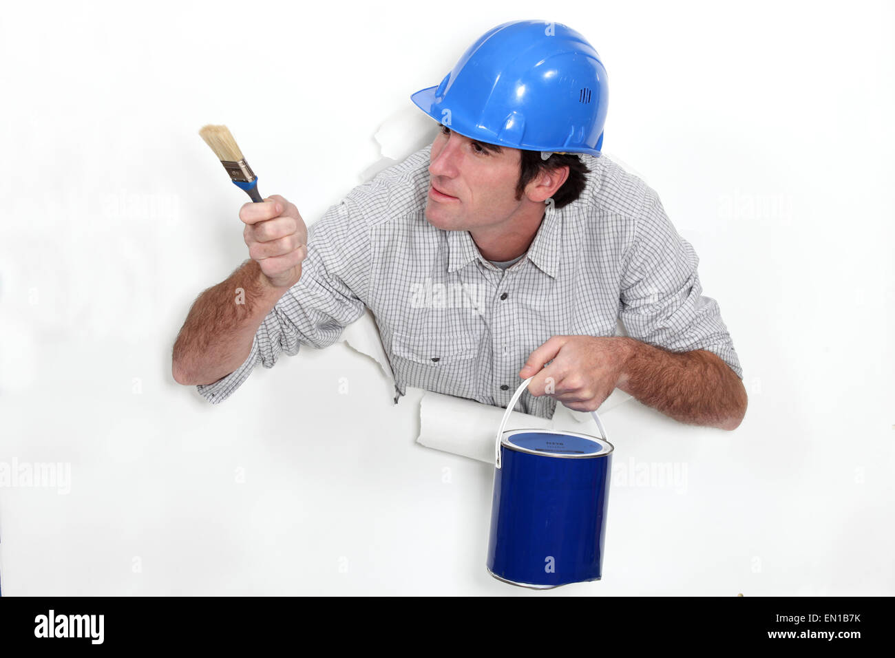 Man with a pot of paint Stock Photo - Alamy