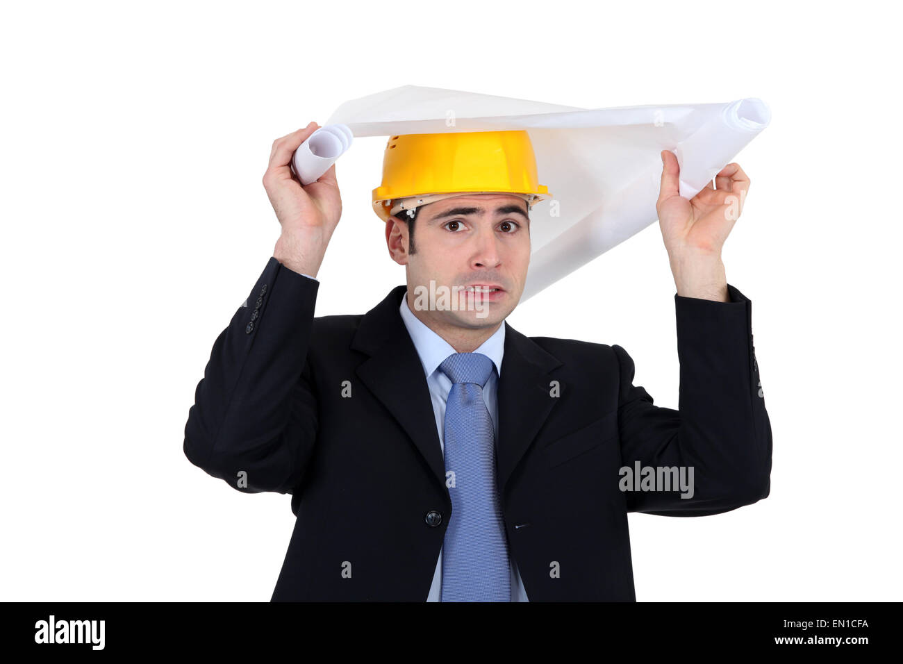 Hiding under jacket hi-res stock photography and images - Alamy