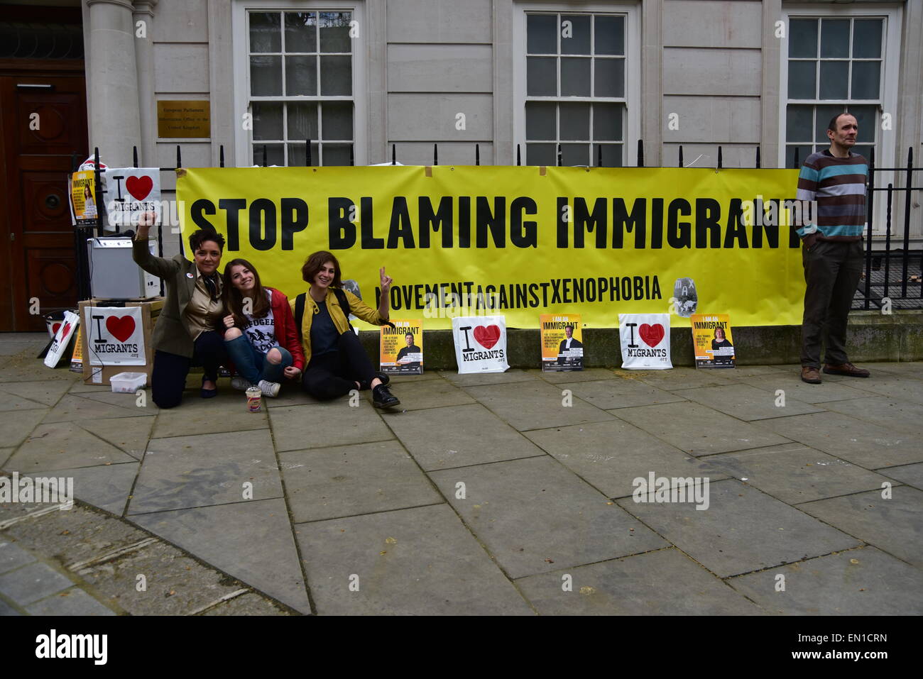 London,UK, 25th April 2015 : A large group protesters, of the Migrant ...