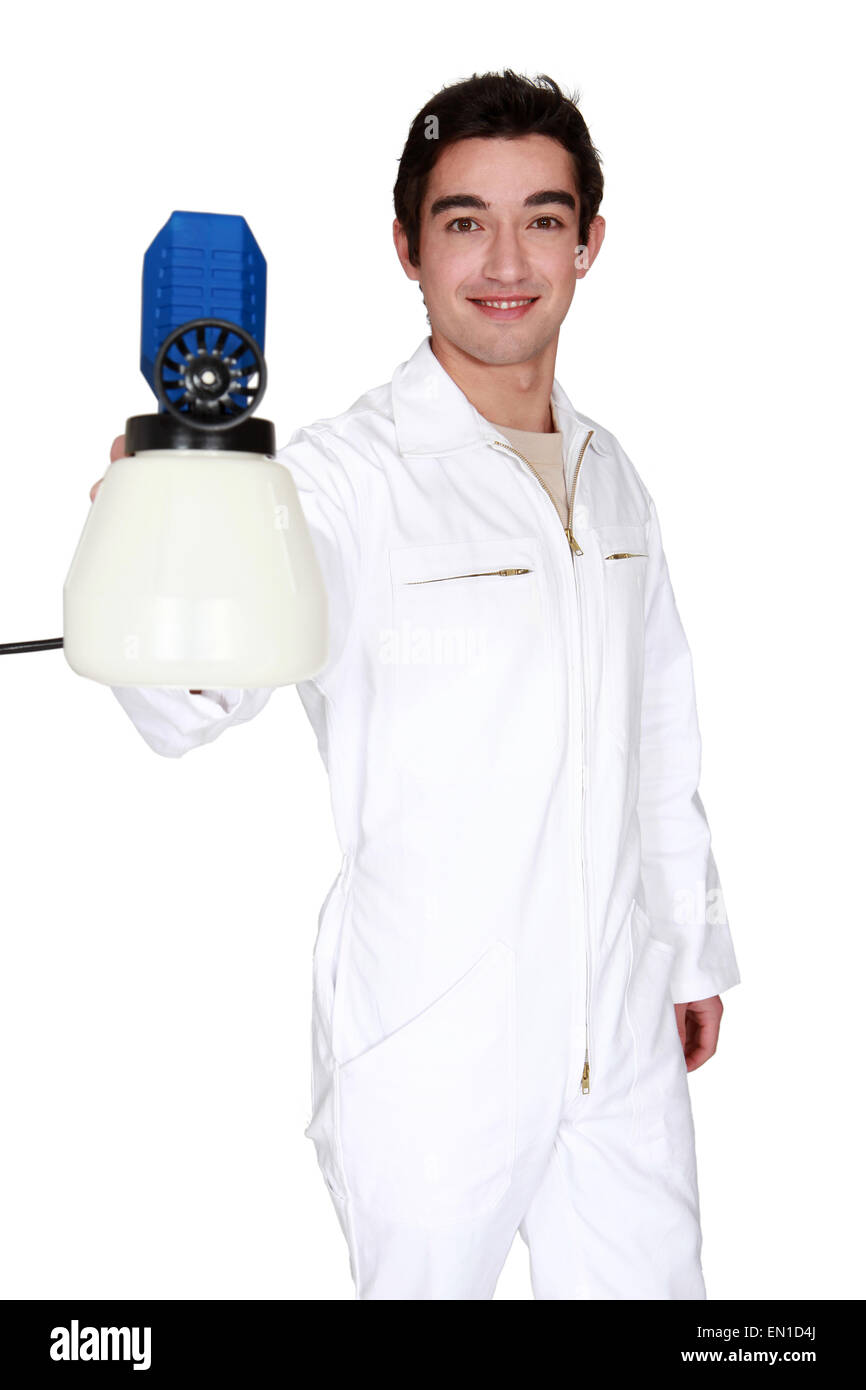 Man holding spray gun Stock Photo - Alamy