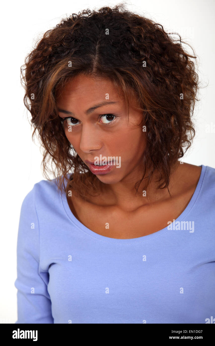 Woman with confused look on face Stock Photo - Alamy