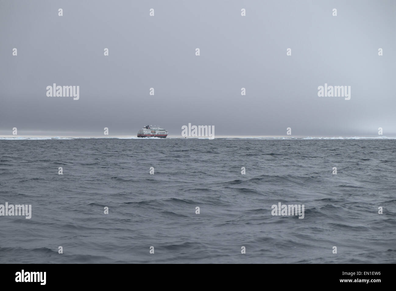 Arctic cruise ship MV Fram at the edge of the North Pole ice sheet ...