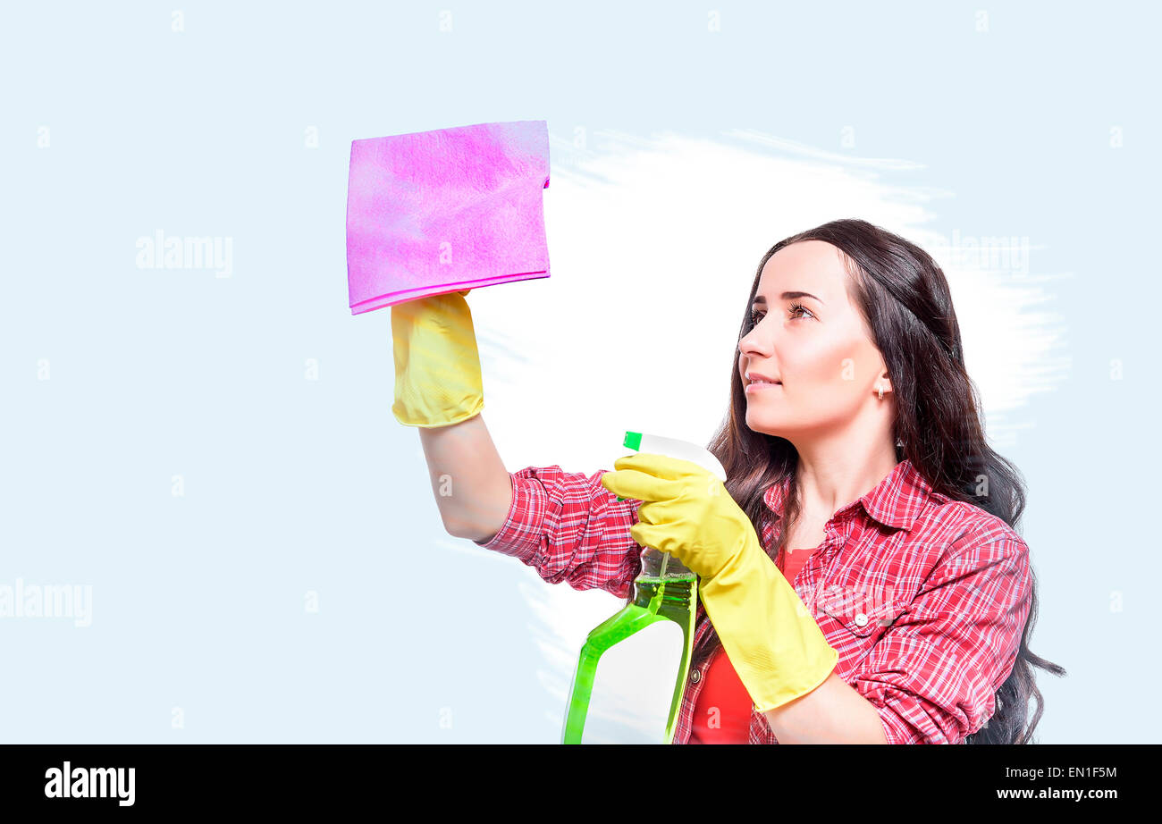 Young happy housewife cleaning Stock Photo - Alamy