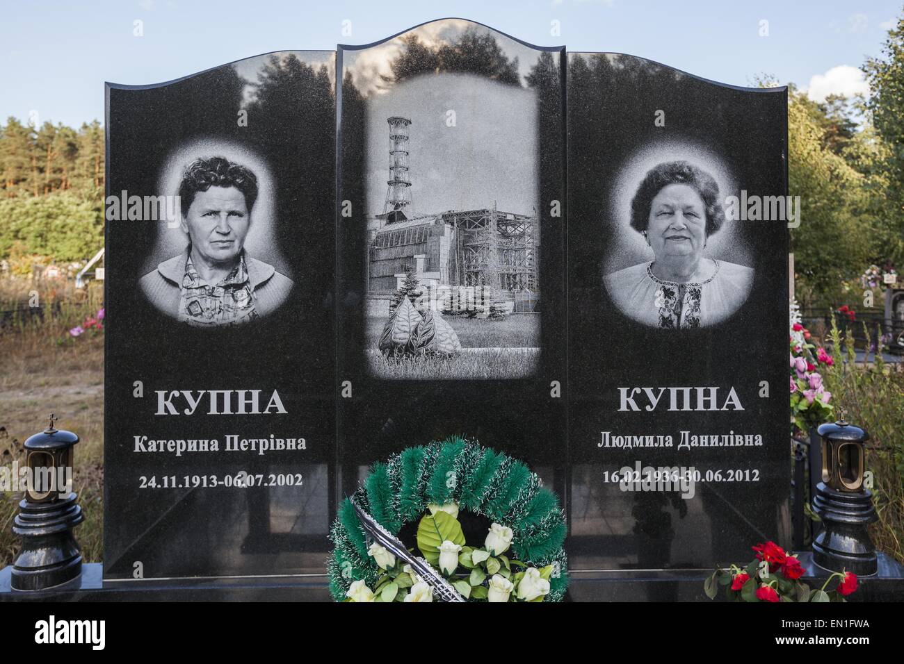 Slavutych, Ukraine. 25th Aug, 2014. Tombstone engraved with the face of ...