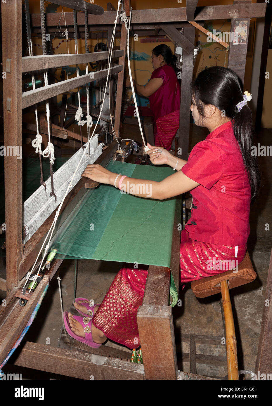 Silk workers, operating hand powered looms, Chiang Mai, Thailand Stock ...