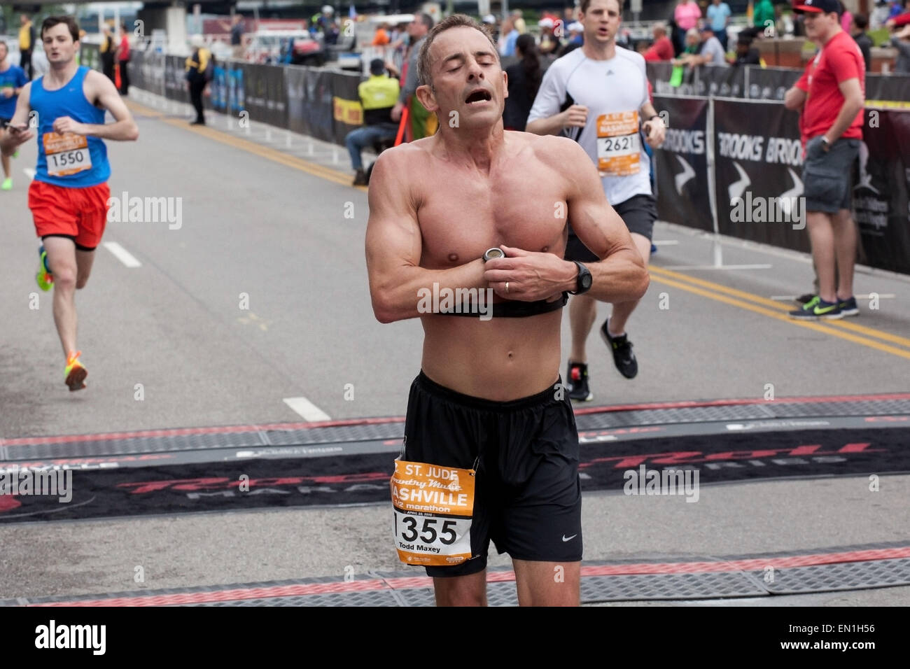 Nashville, Tennessee, USA. 25th Apr, 2015. Runner TODD MAXEY breathes a ...