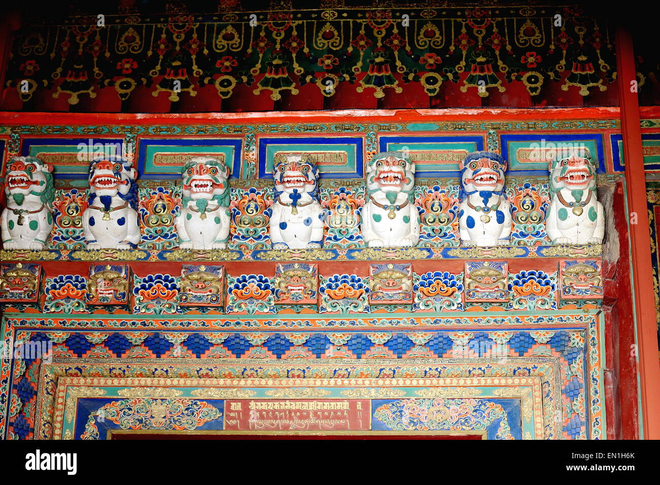 Colorist wood carved door lintel depicting tibetan traditional ...