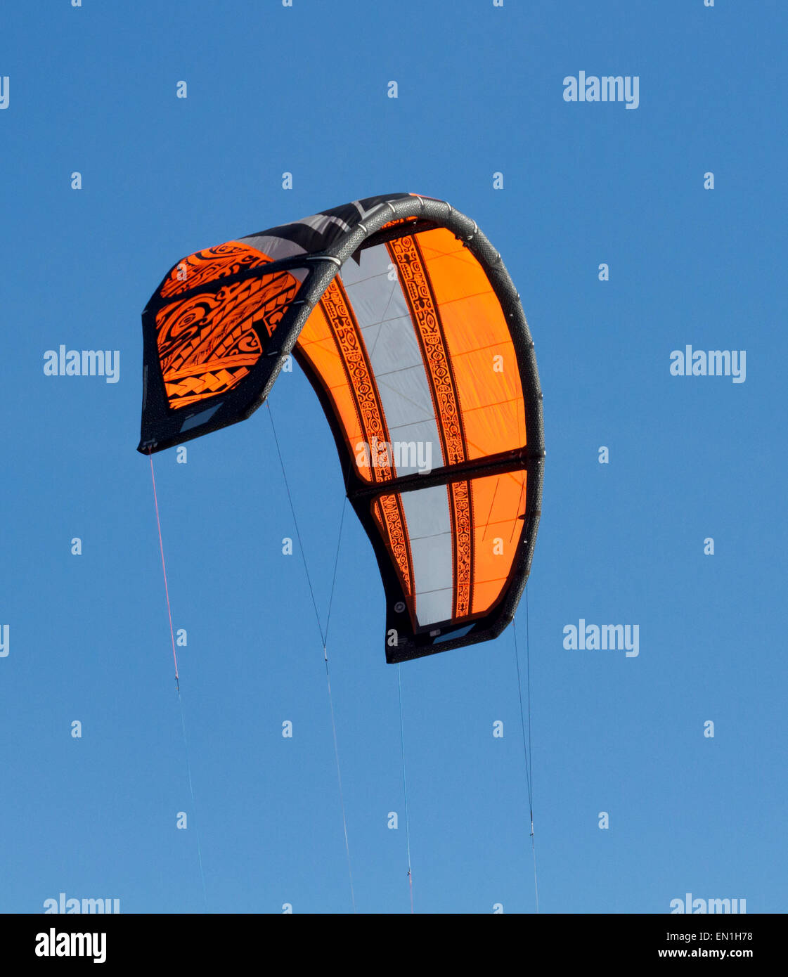 High flying Power Kite against a blue sky Stock Photo - Alamy