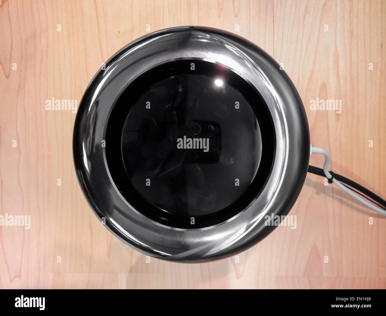 TORONTO, CANADA - DECEMBER 29, 2013: The new Mac Pro sits at the Apple ...