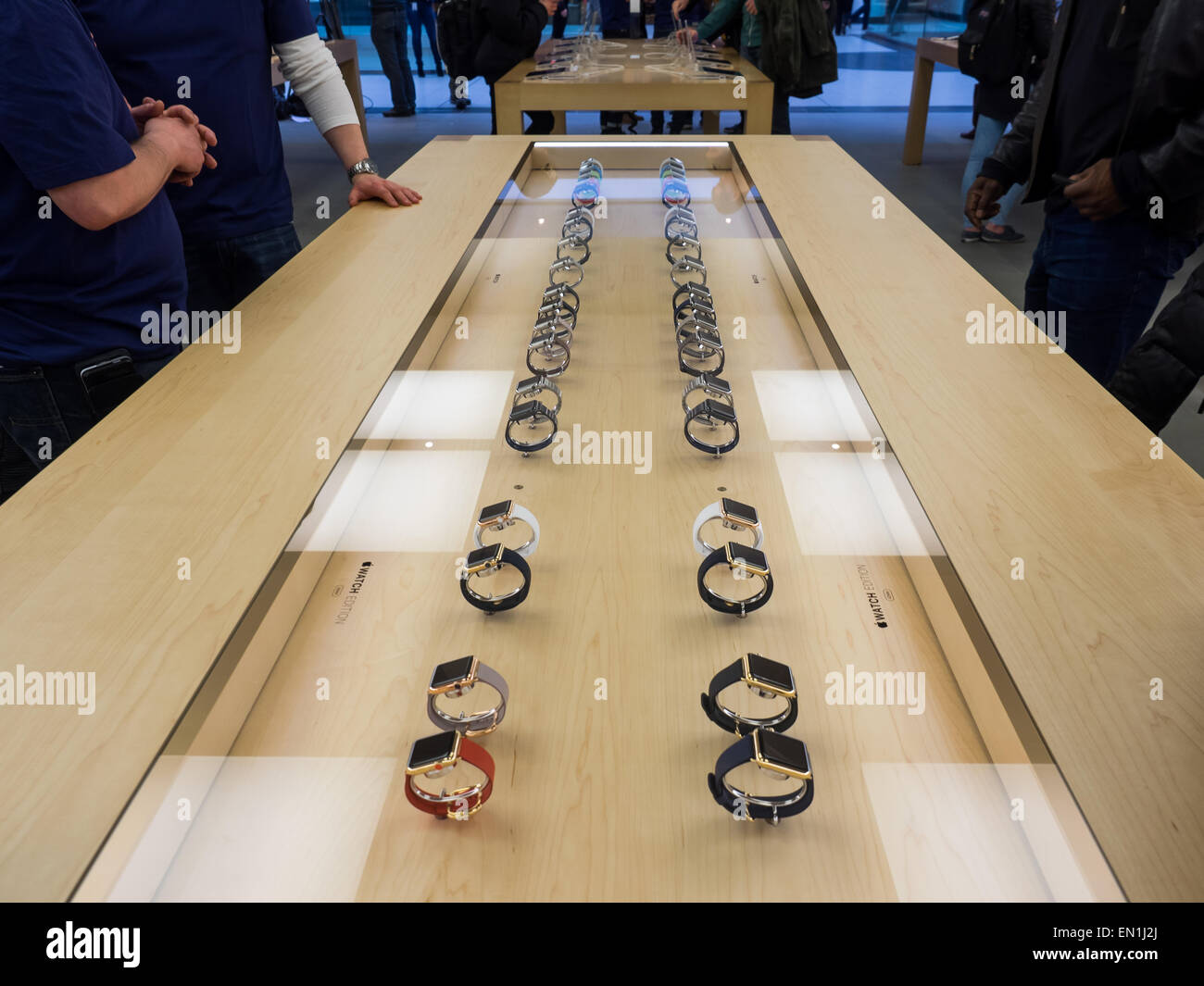 TORONTO, CANADA - APRIL 10, 2015: An array of new Apple Watch sit at ...