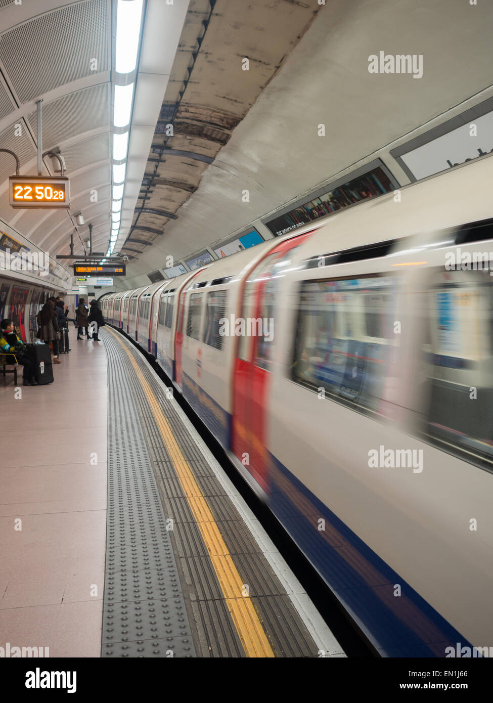 Blurred train in a London underground station Stock Photo - Alamy