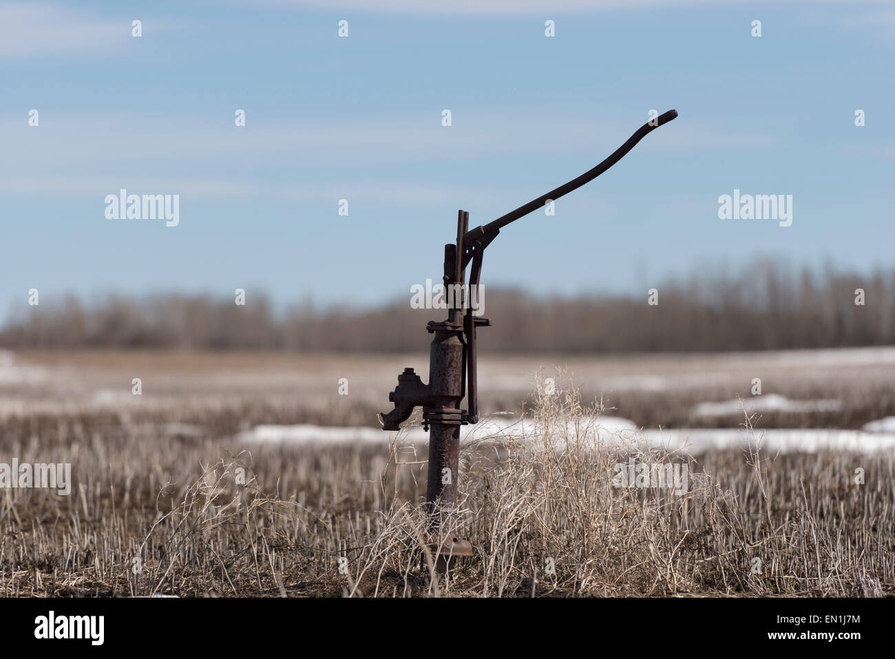 Rusty water well pump Stock Photo - Alamy