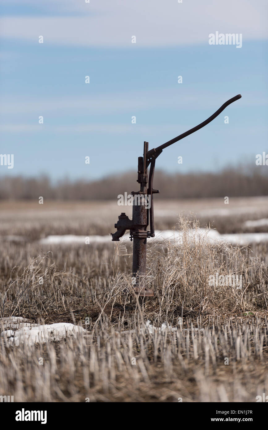 Rusty water well pump Stock Photo - Alamy