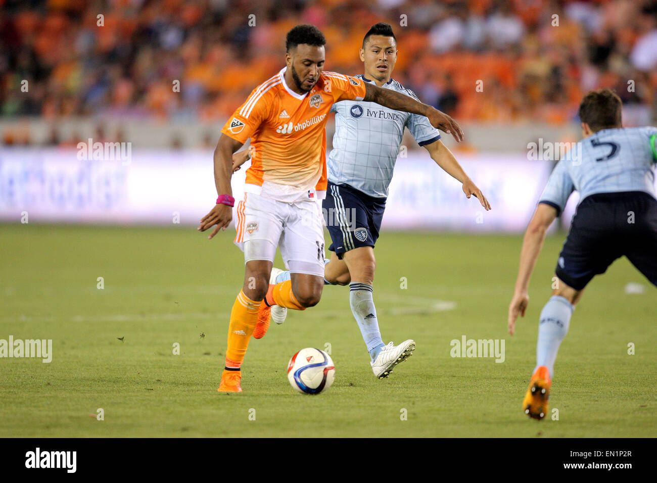 APR 25 2015: Houston Dynamo forward Giles Barnes #10 reaches back to ...