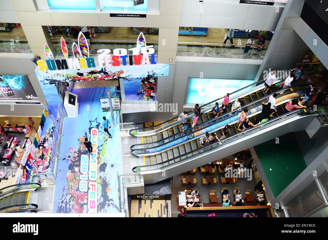 People on escalator is a moving staircase at shopping mall on April 5, 2015 in Bangkok Thailand ...