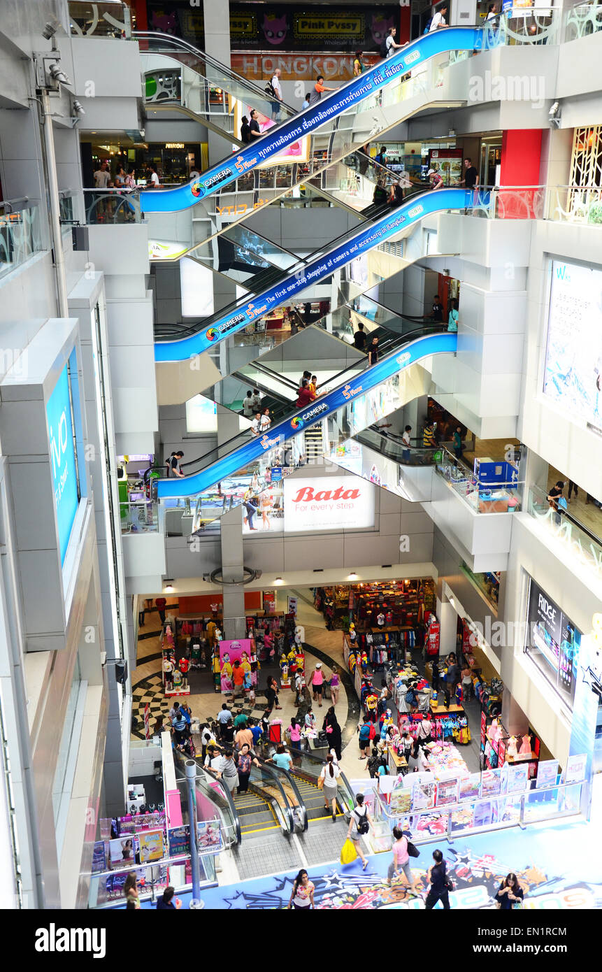 People on escalator is a moving staircase at shopping mall on April 5, 2015 in Bangkok Thailand ...