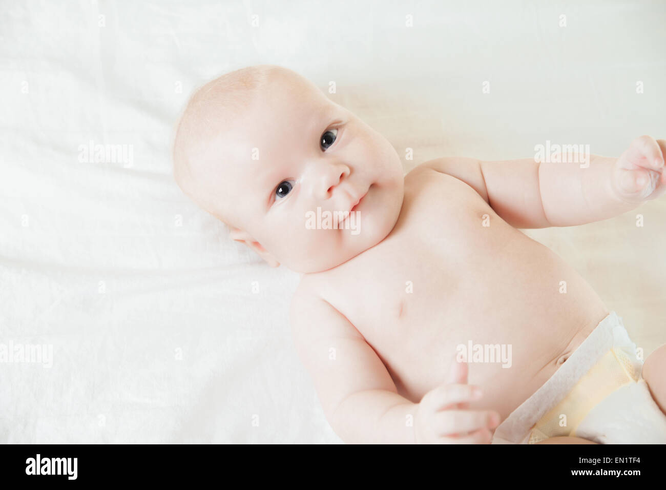 Cute Newborn Baby Lying on Back Stock Photo - Alamy