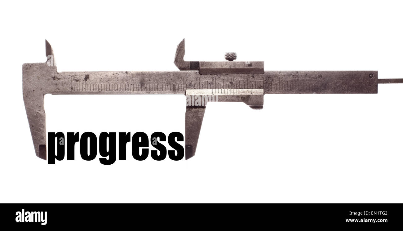 Color horizontal shot of a caliper and measuring the word "progress ...