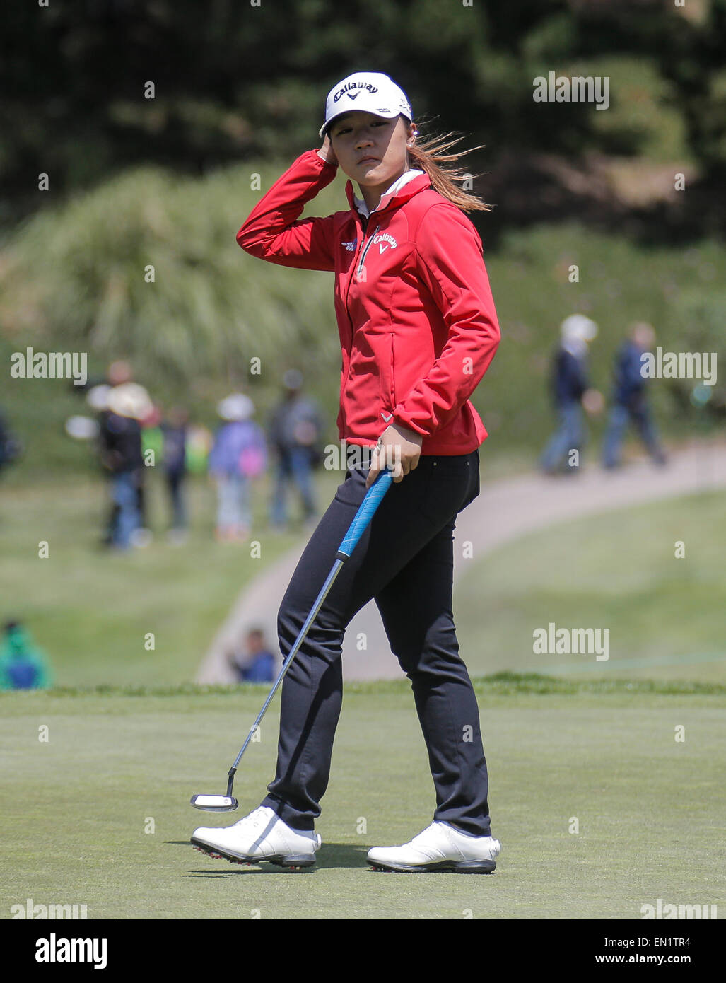 San Francisco, CA. 25th Apr, 2015. Lydia Ko looks down the fairway ...