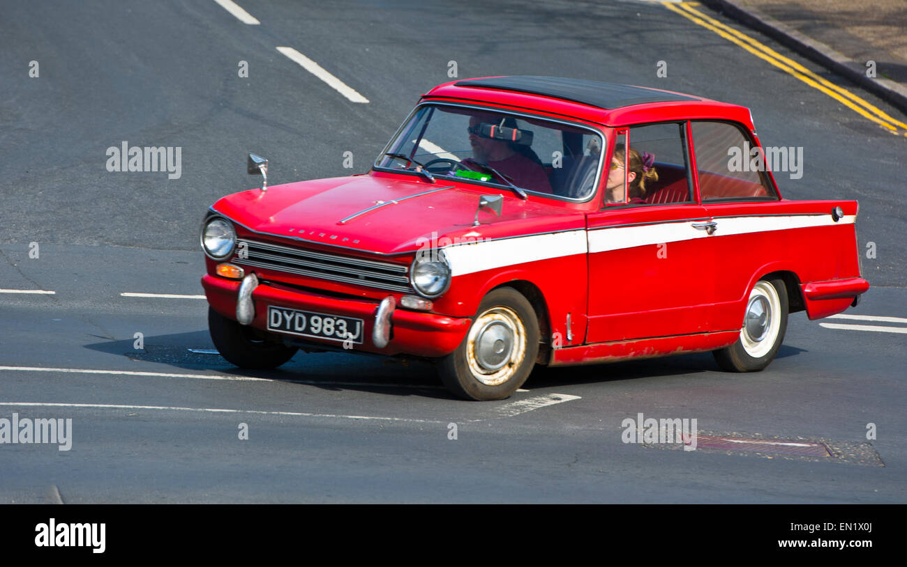 Red British classic Triumph Herald 13/60 saloon Stock Photo - Alamy