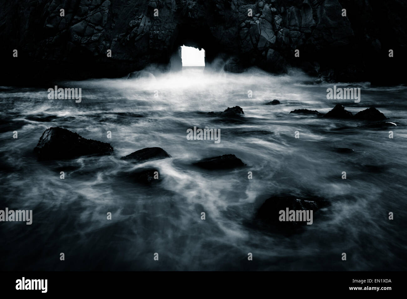 Waves in the Pacific Ocean and the Keyhole Rock at Pfeiffer Beach, in ...