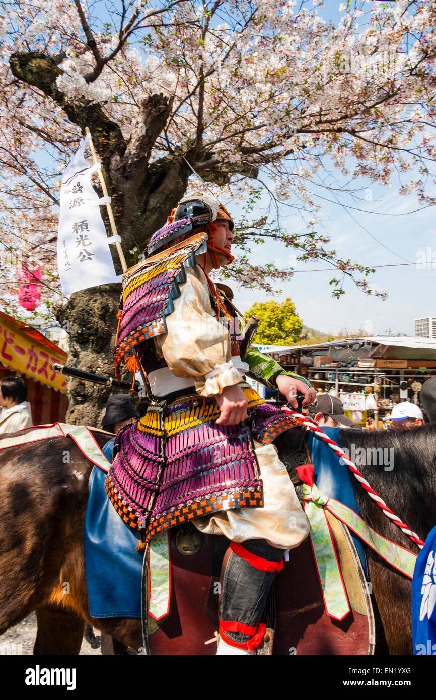 Japanese man dressed in full samurai armour and Kabuto helmet, on ...