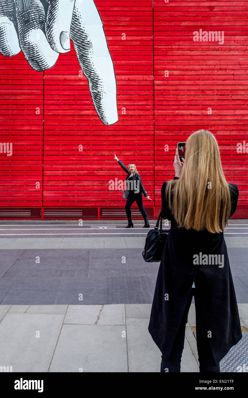 Woman points finger street hi-res stock photography and images - Alamy