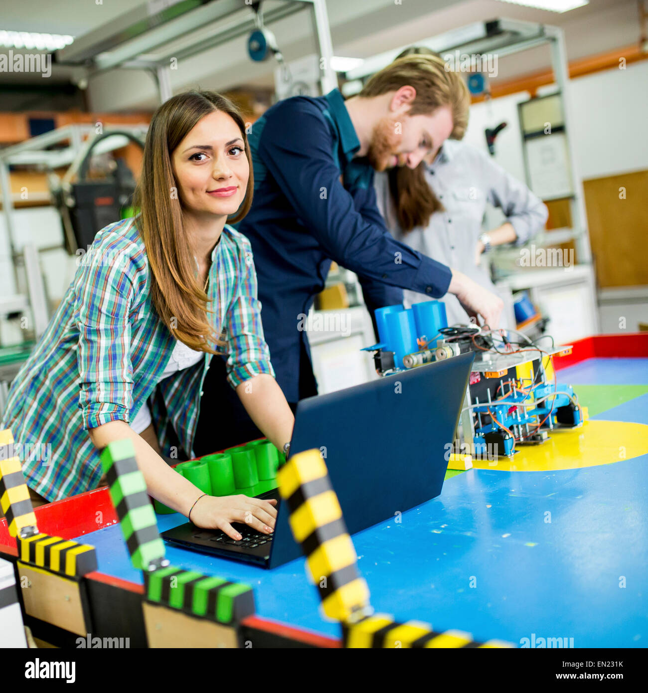 Young people in the robotics classroom Stock Photo - Alamy