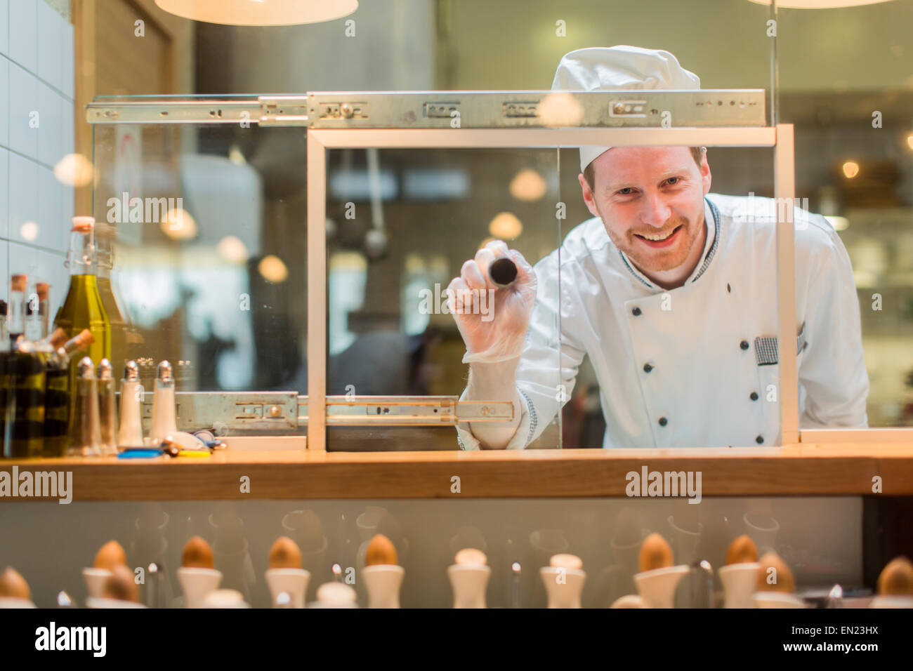 Chef in the restaurant Stock Photo - Alamy