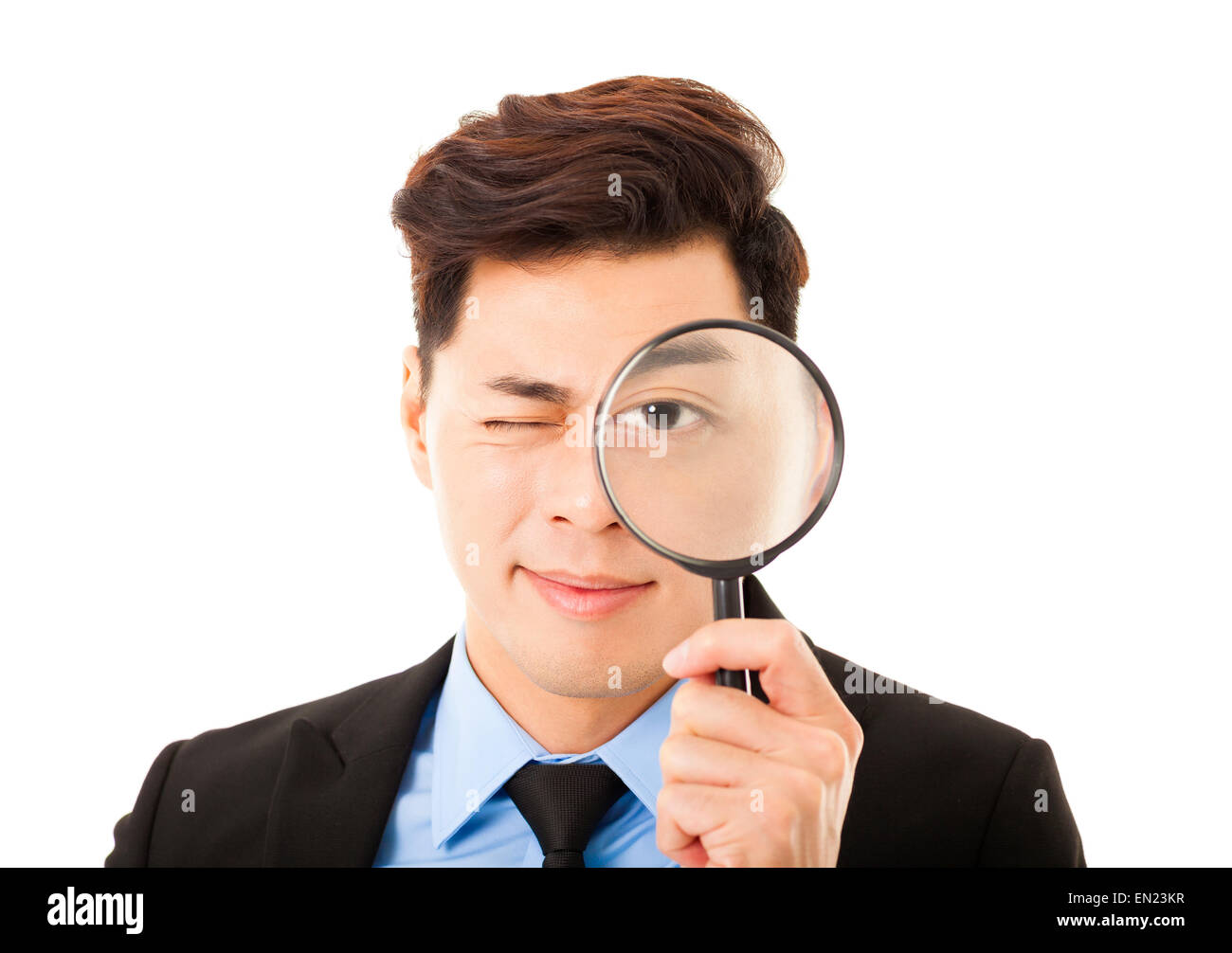 Businessman looking through magnifying glass Stock Photo - Alamy Businessman looking through magnifying glass Stock Photo - Alamy
