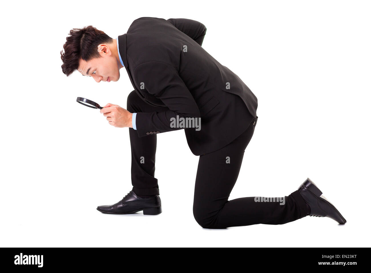 Magnifying glass searching people hi-res stock photography and images ...