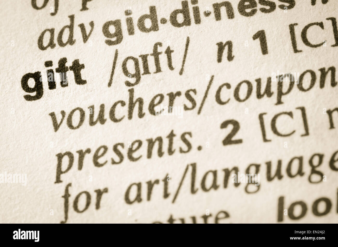 Definition of word gift in dictionary Stock Photo - Alamy