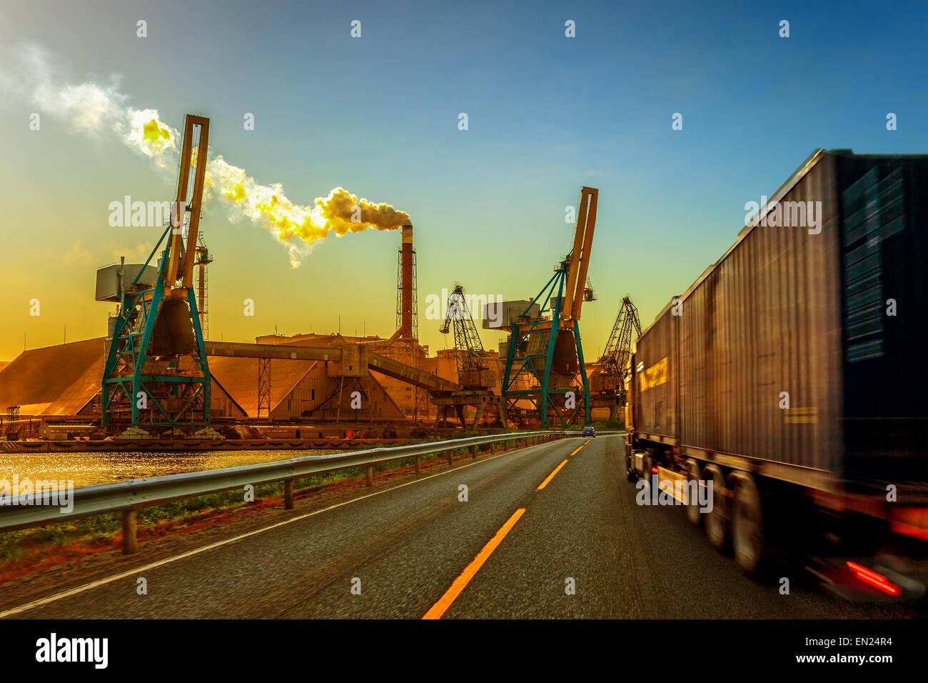 Truck transport container on the road to the port Stock Photo - Alamy