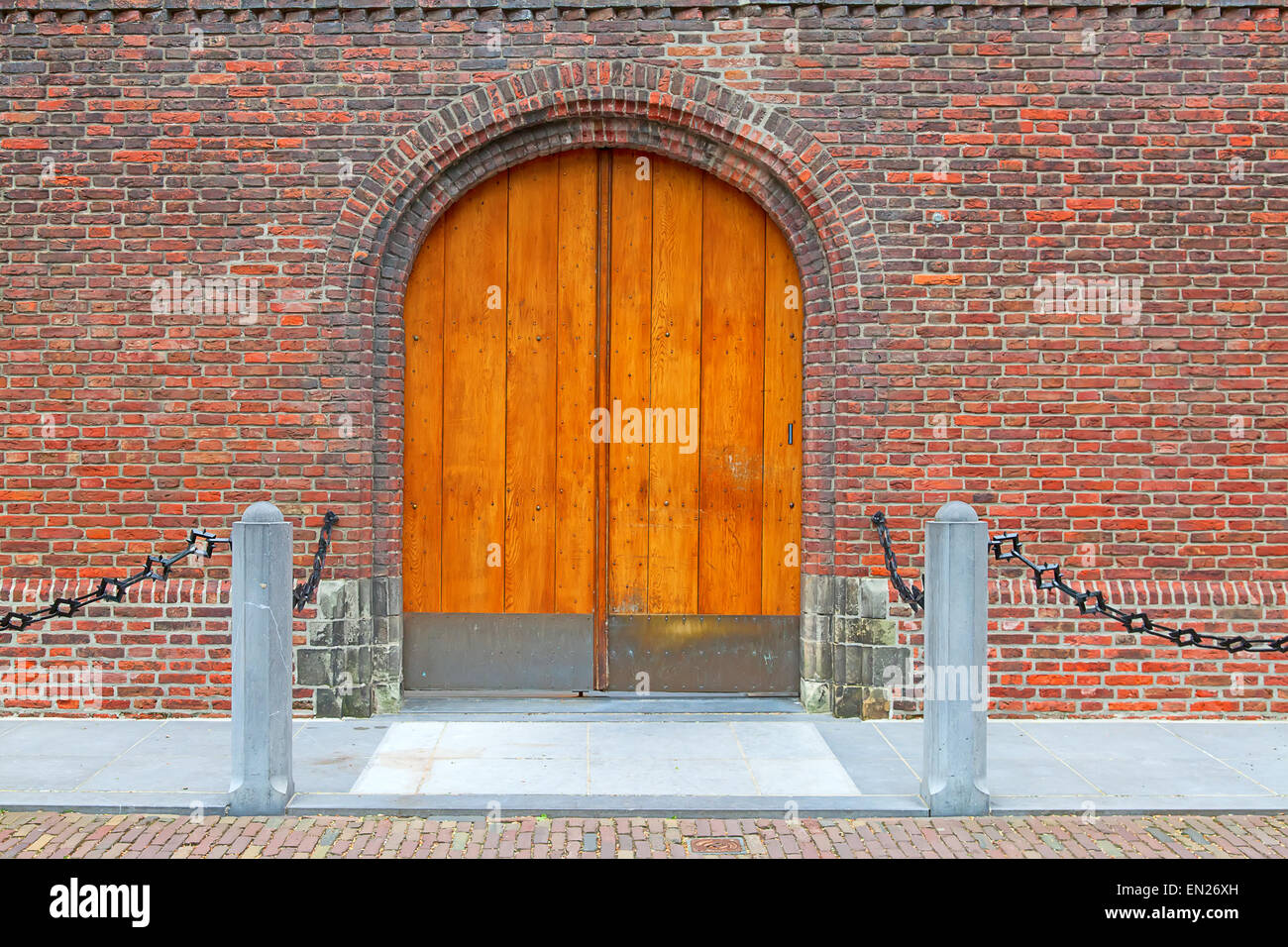 Door on the brick wall Stock Photo - Alamy