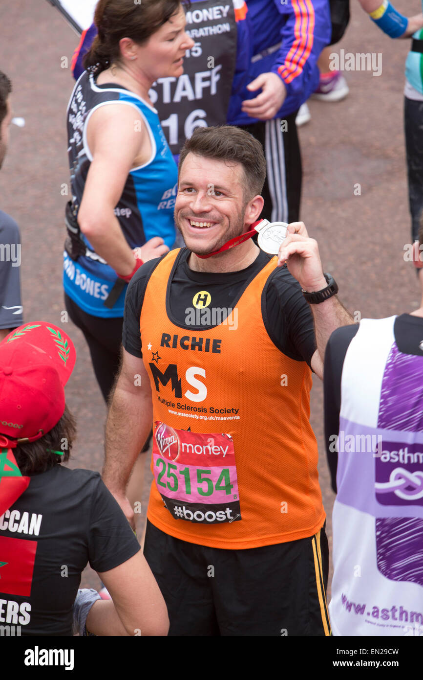 Richard Firth crosses the finish line of the Virgin money London ...