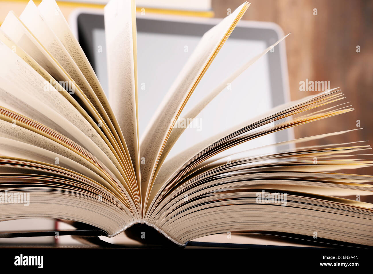 Composition with books and tablet computer on the table Stock Photo - Alamy