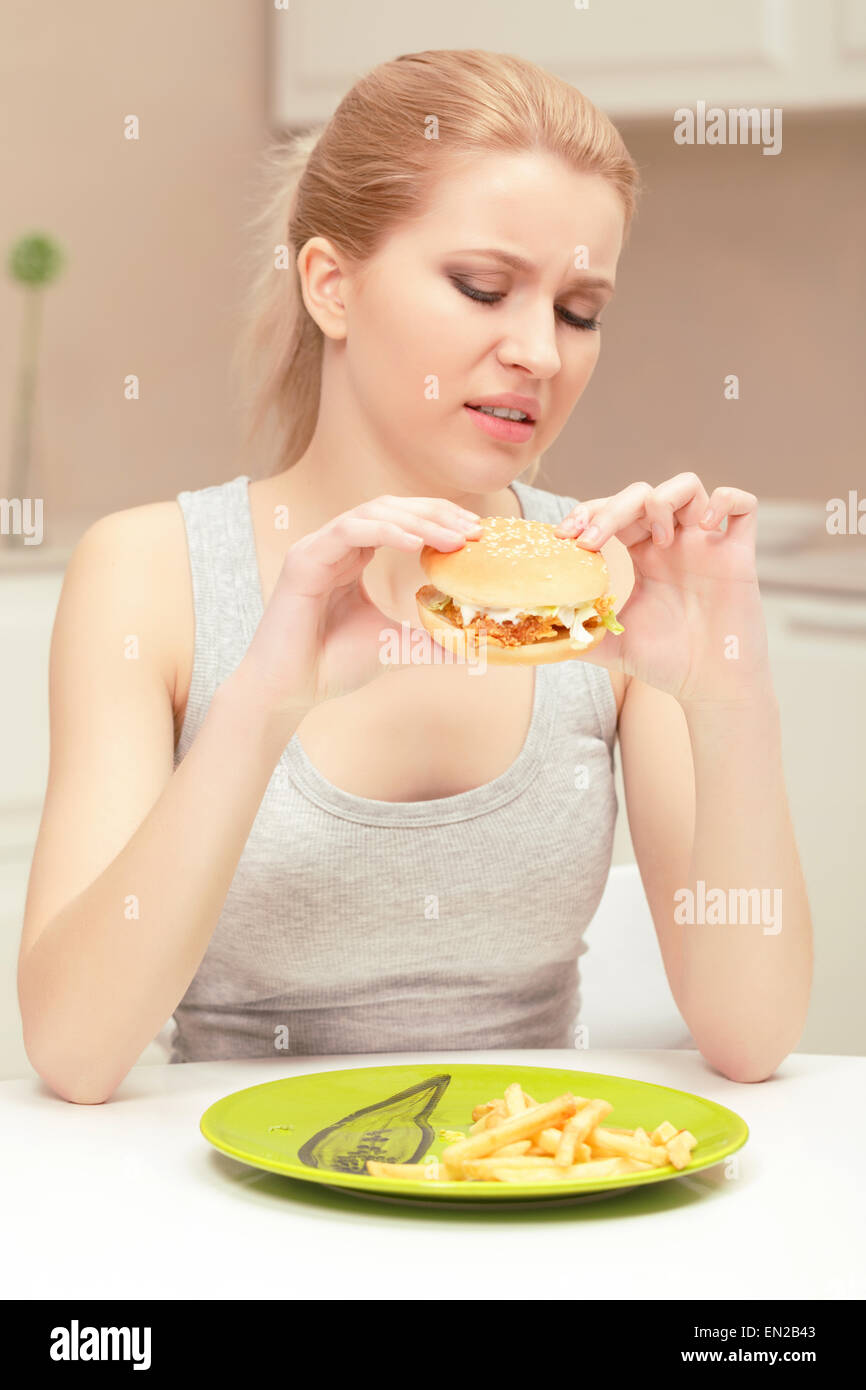 Woman eating mayo sandwich hi-res stock photography and images - Alamy