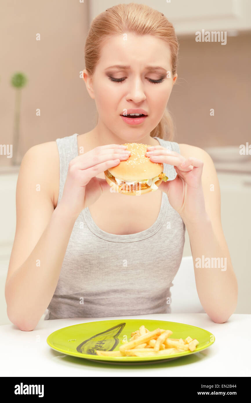 Woman eating mayo sandwich hi-res stock photography and images - Alamy